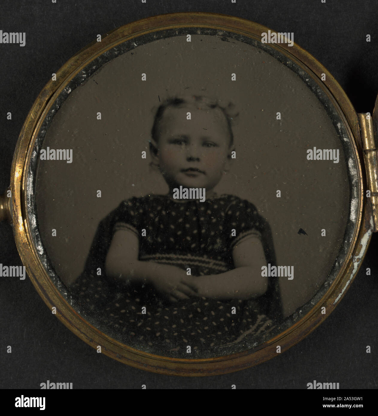 Two unidentified portraits of girl and boy in locket Stock Photo - Alamy