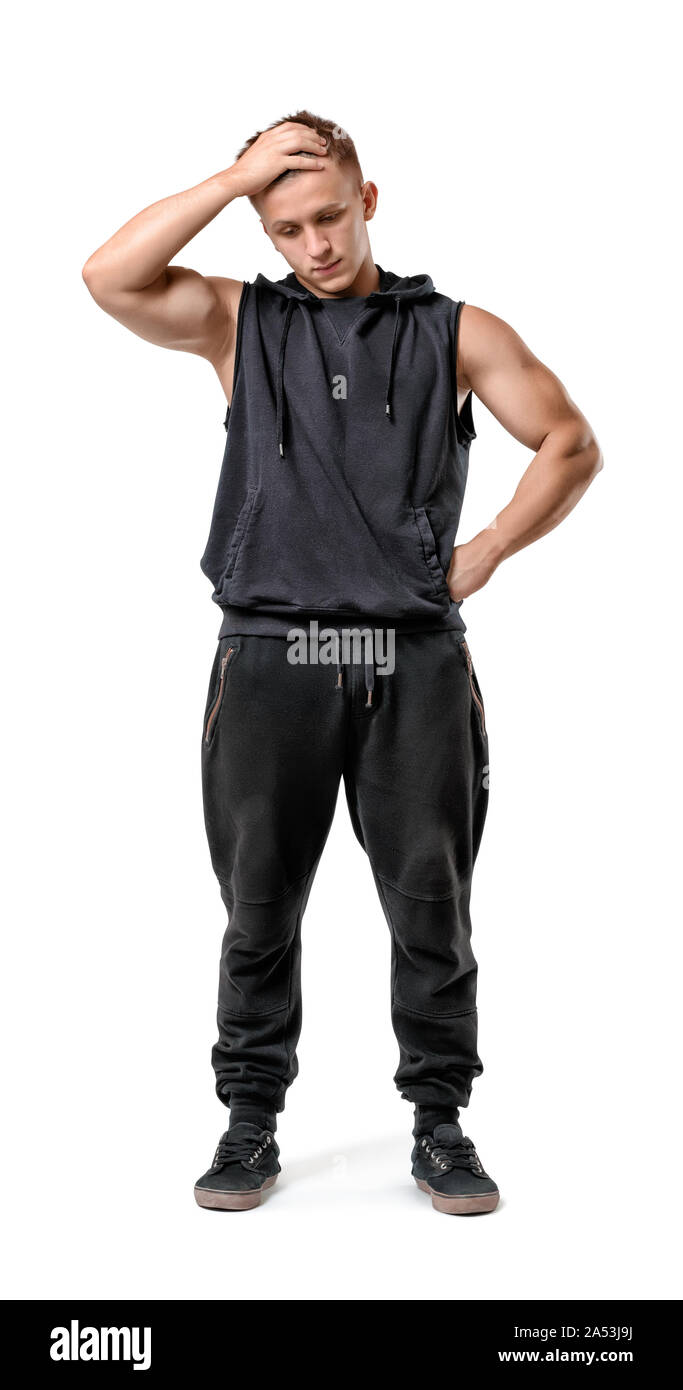 Full body portrait of handsome muscled young man thinking isolated on ...