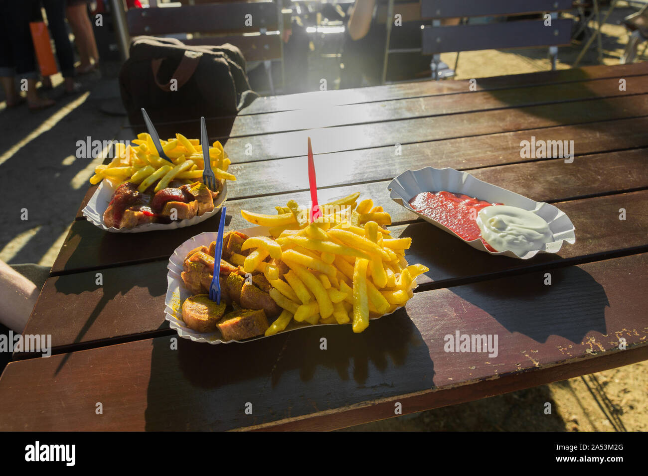 Currywurst in sunny Berlin. Delicious street food in Germany. French ...