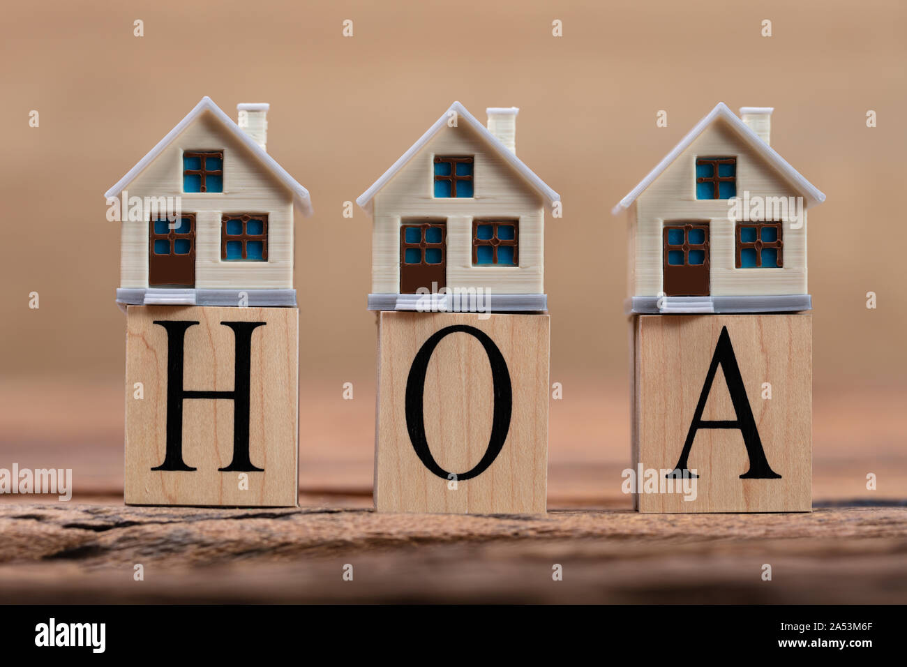 House Models Around HOA Cubic Blocks On Wooden Desk Stock Photo - Alamy