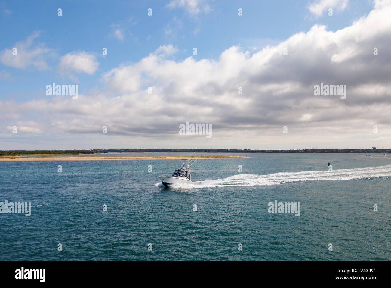 A high speed sport fishing charter boat departs towards Nantucket Sound ...