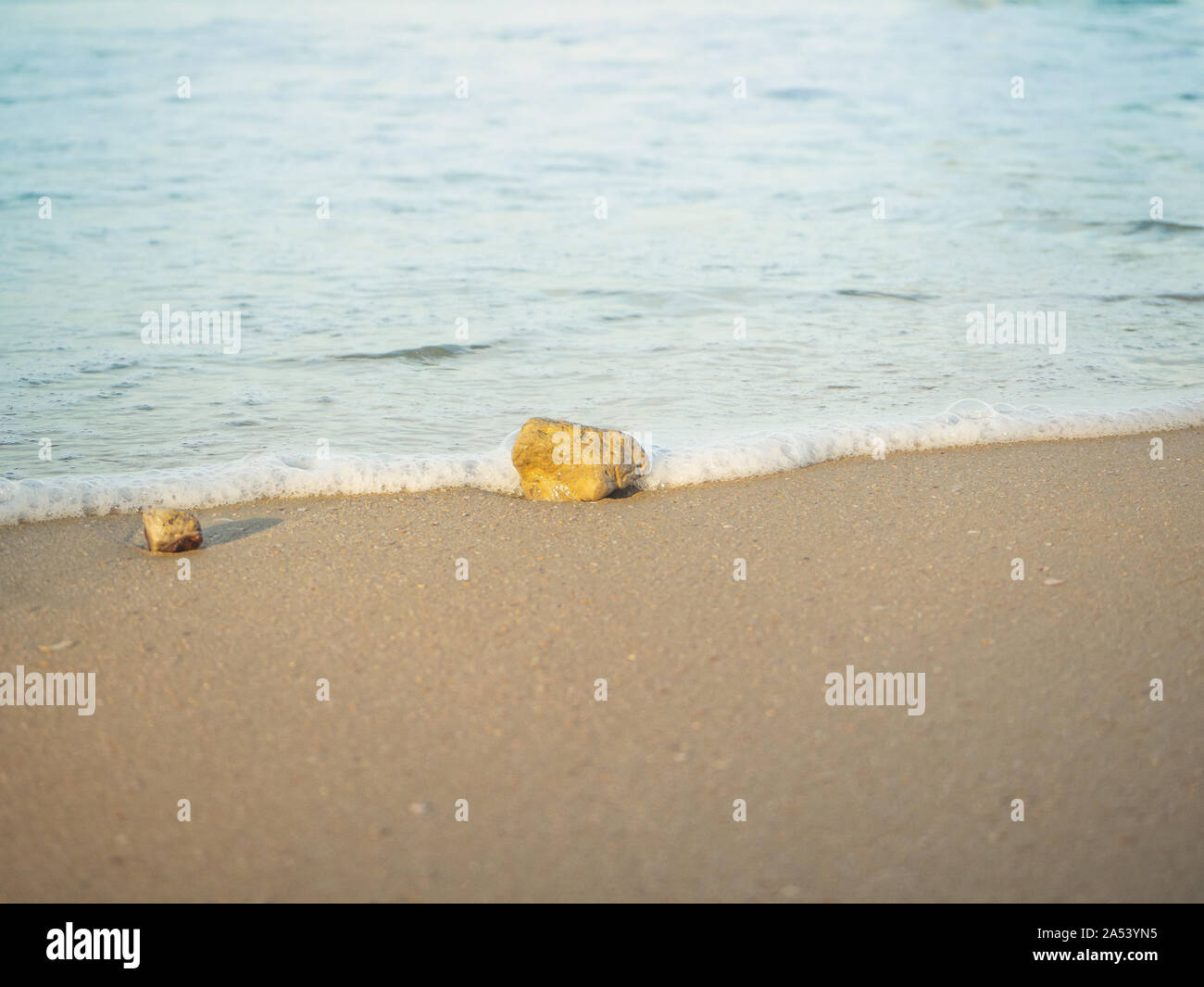 Stones placed on the beach Stock Photo - Alamy