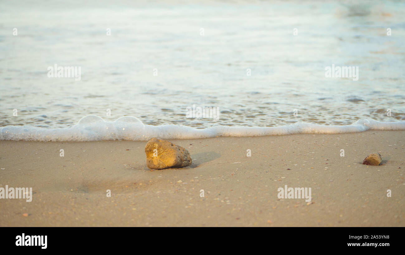 Stones placed on the beach Stock Photo - Alamy
