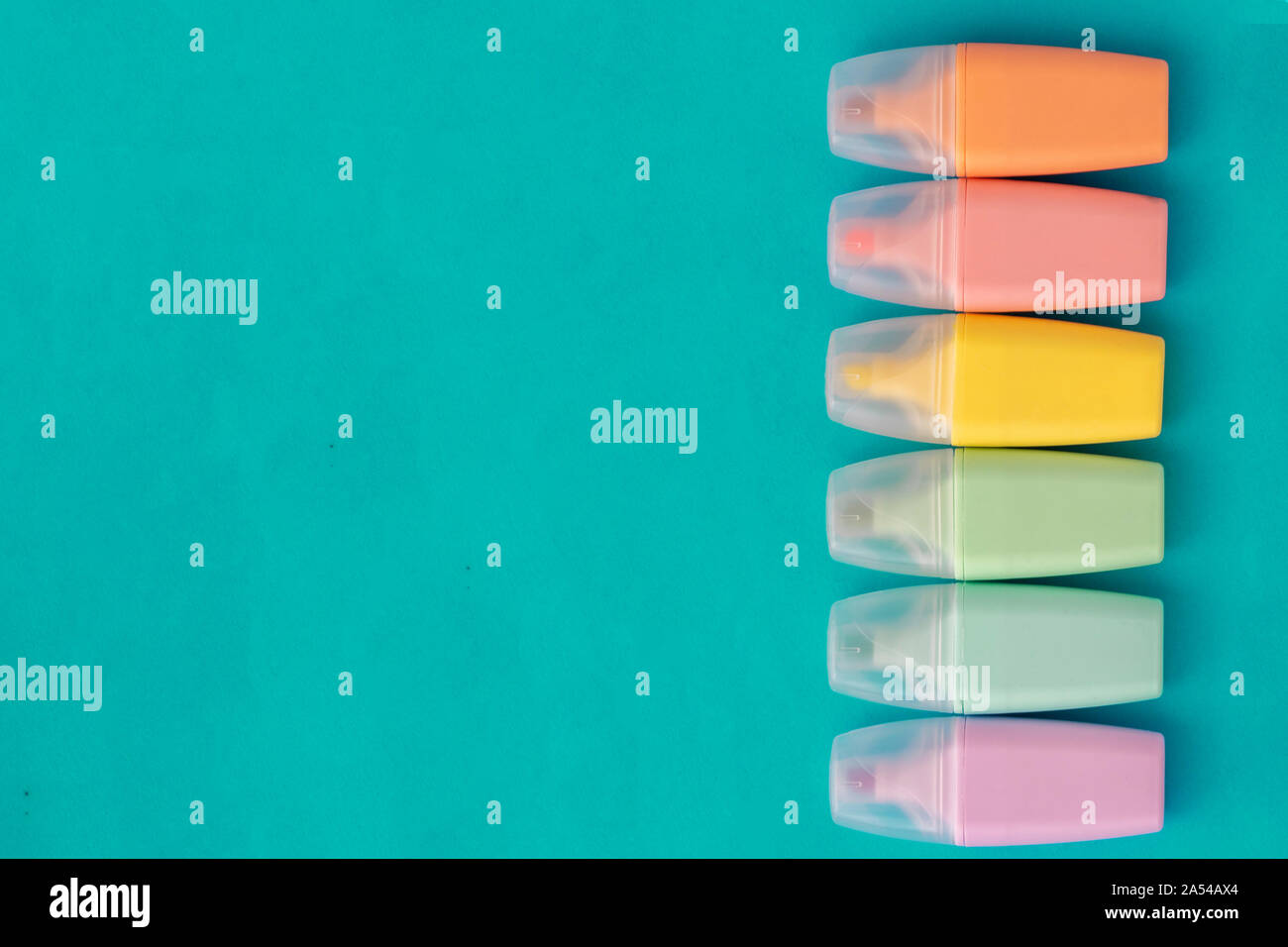 Highlighters set on colored green background. Collection of markers ...