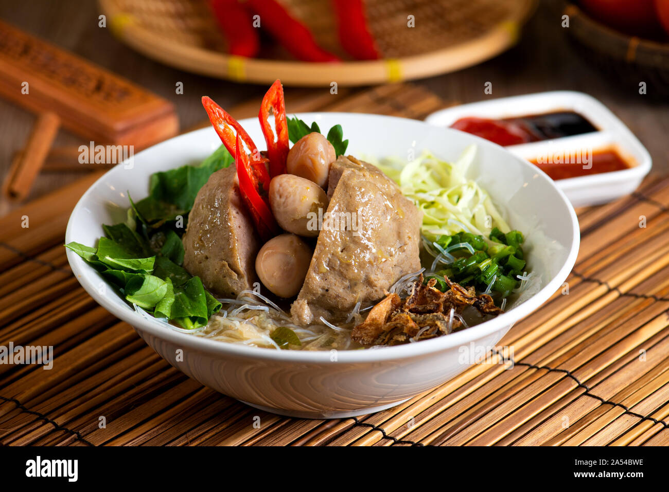 bakso. indonesian meatball served with soup and noodle Stock Photo - Alamy