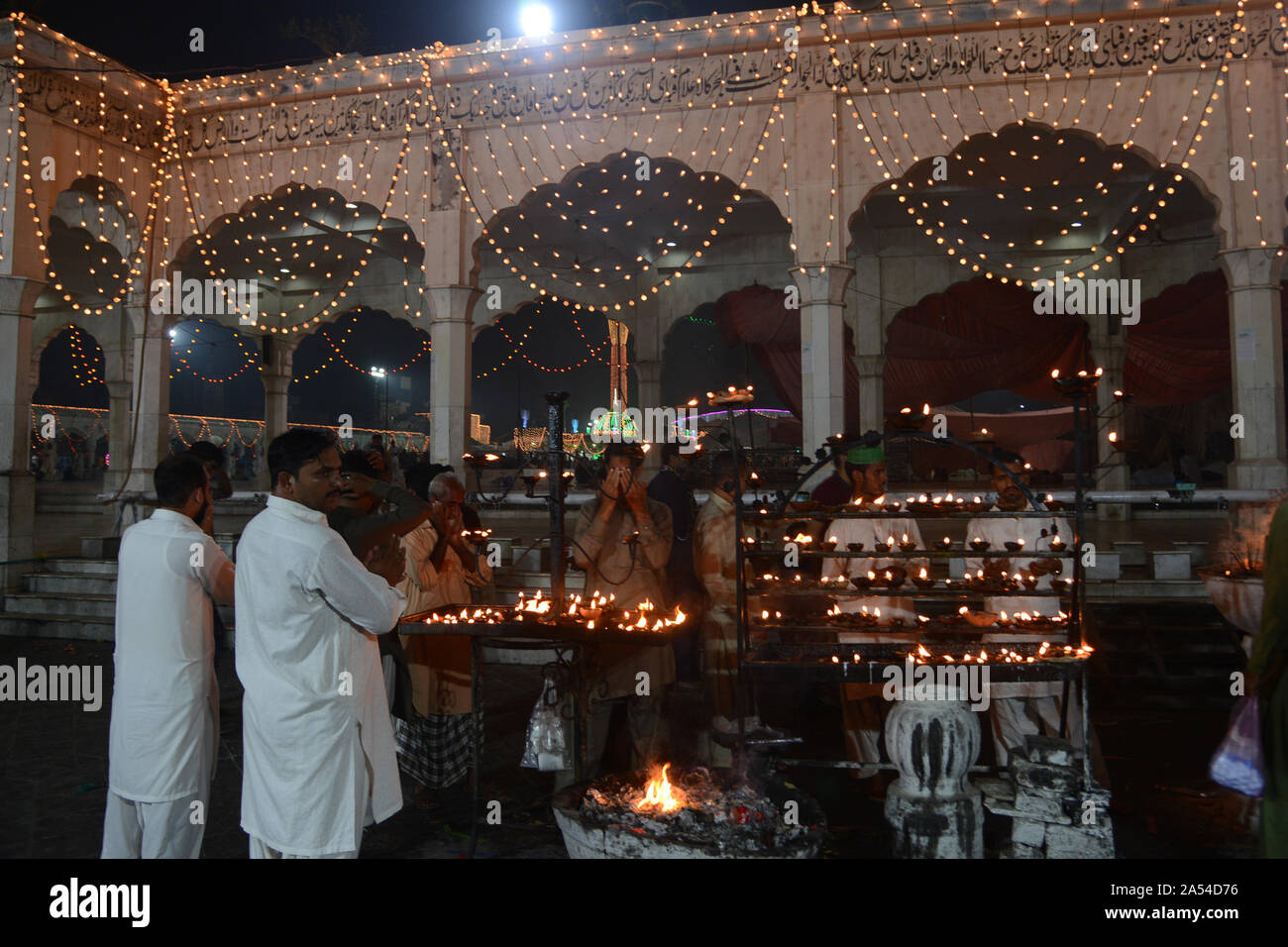 Pakistani devotee people take part in 976th Urs celebrations and an attractive illuminated with ...