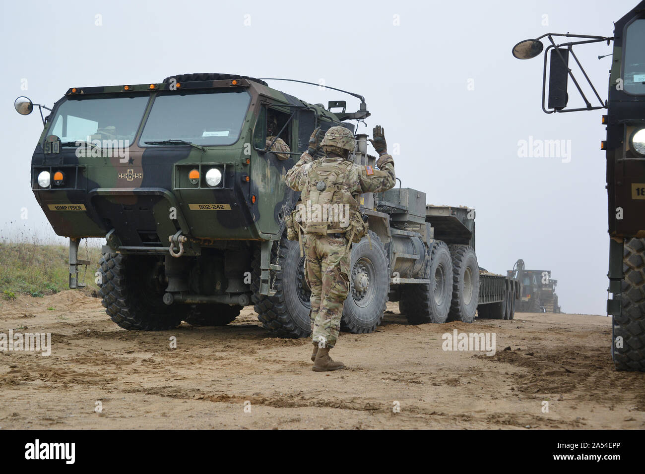A U.S. Soldier with 902nd Engineer Construction Company, 15th Engineer ...