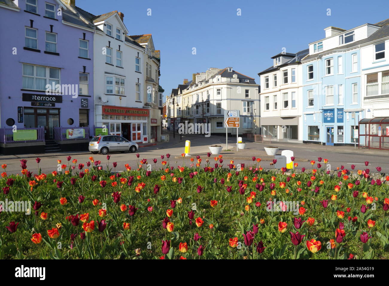 View up Fore Street in Seaton, Devon from the Esplanade Stock Photo - Alamy