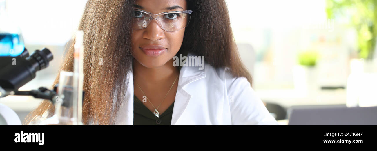 Black female chemist student conducting research Stock Photo - Alamy