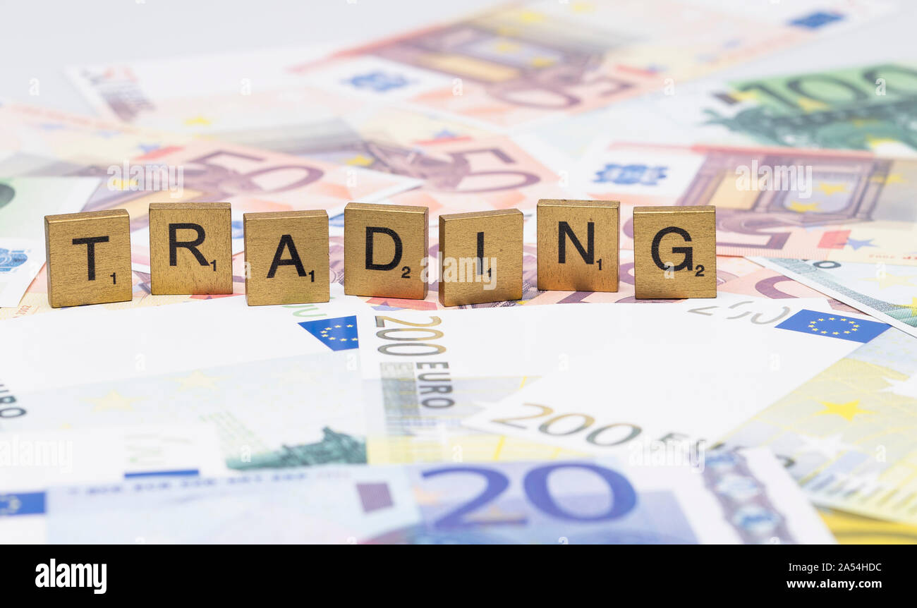 Image shows different banknotes with golden letters and the word ...