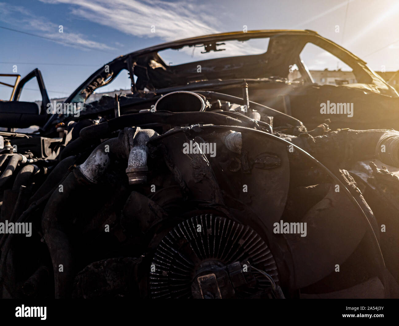 A burnt car engine with propeller after a fire or an accident in a ...