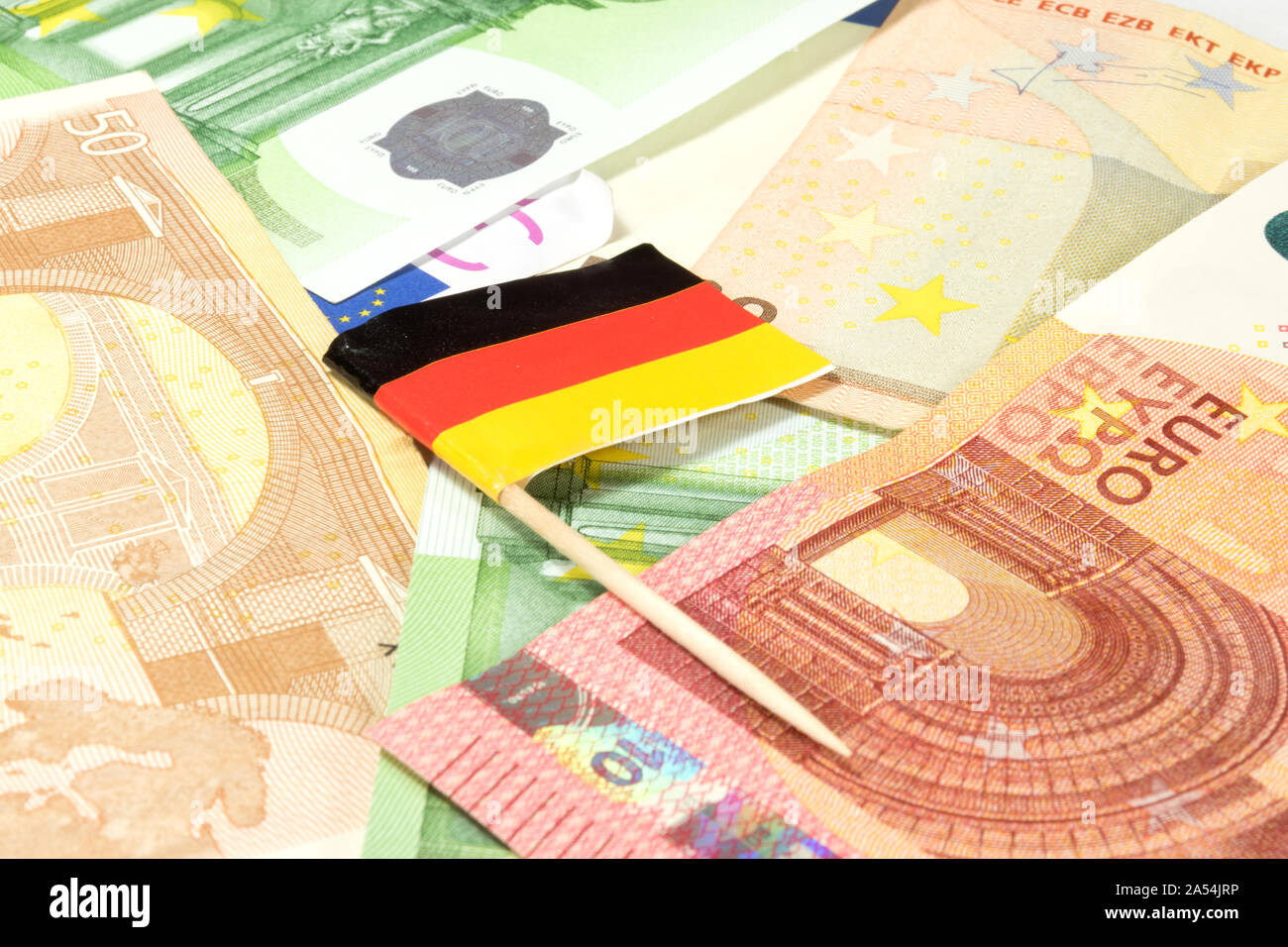 Euro bills and flag of Germany Stock Photo - Alamy