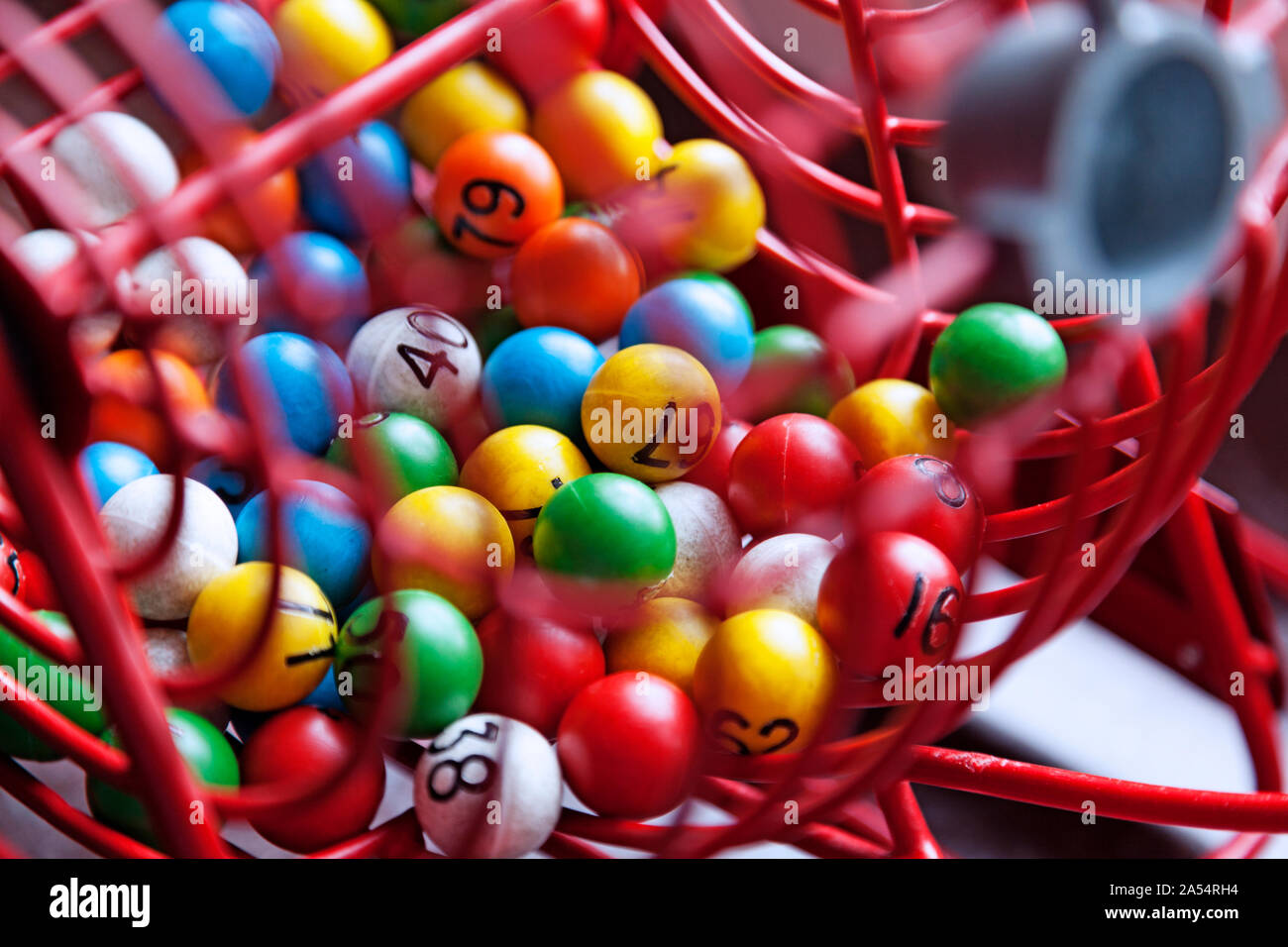 lottery games with different colored balls with numbers Stock Photo - Alamy