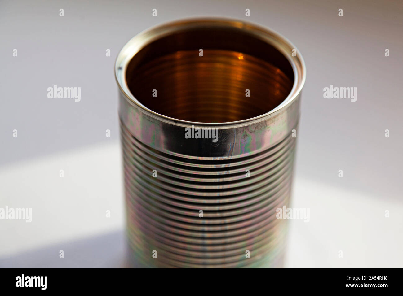 an empty tin can in the windowsill of the office Stock Photo - Alamy