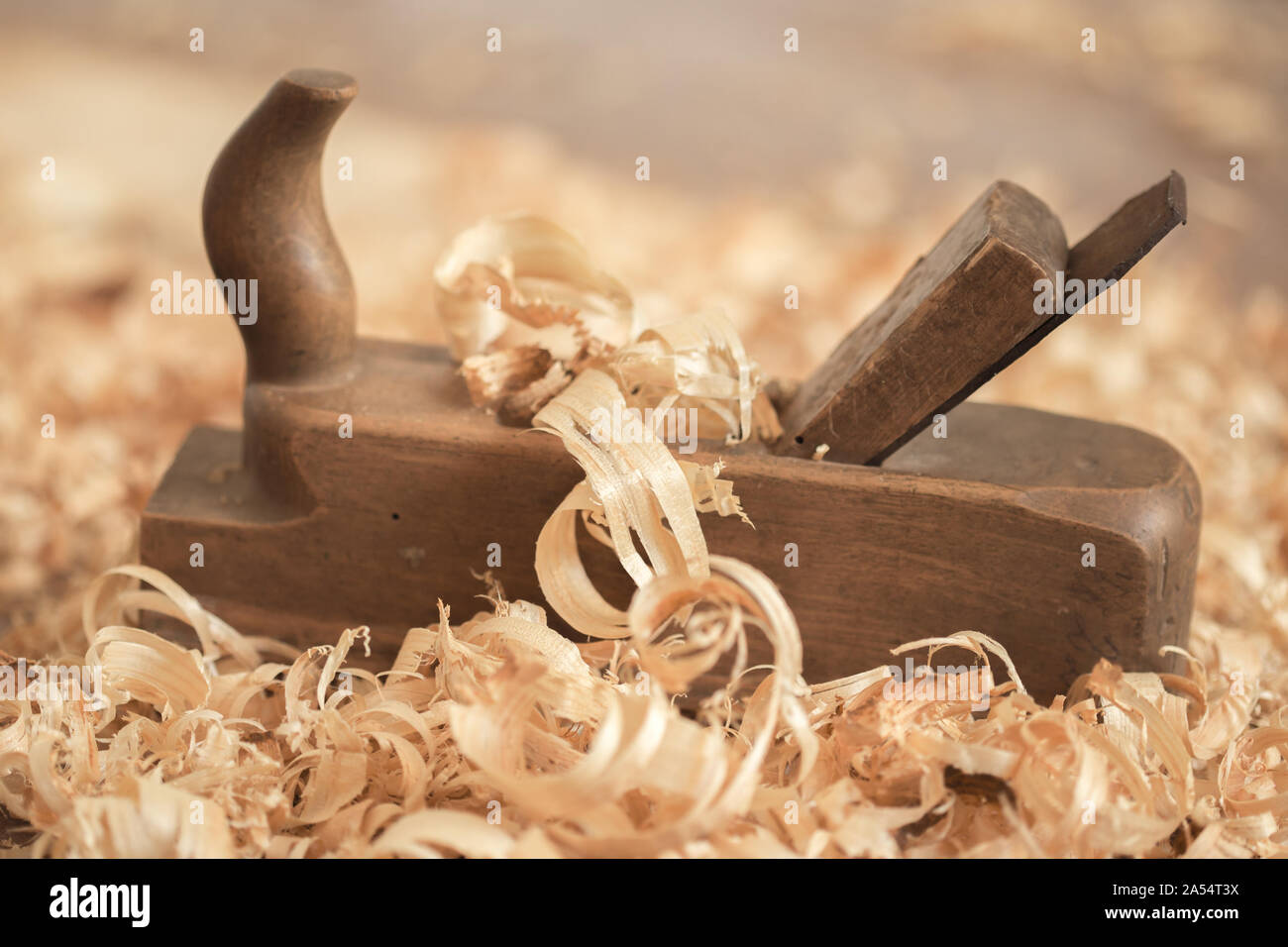 Old wooden hand plane for woodworking with wood shavings Stock Photo ...