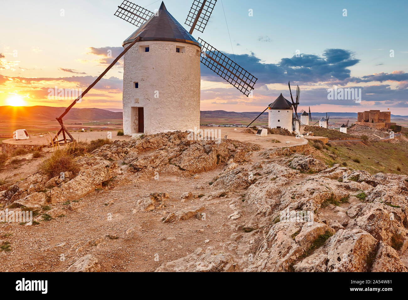 Traditional antique windmills at sunset in Spain. Consuegra, Toledo ...