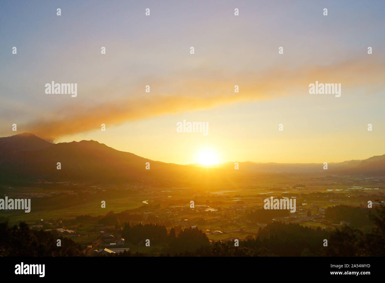Volcanic smoke and rising sun, Aso area, Japan Stock Photo - Alamy