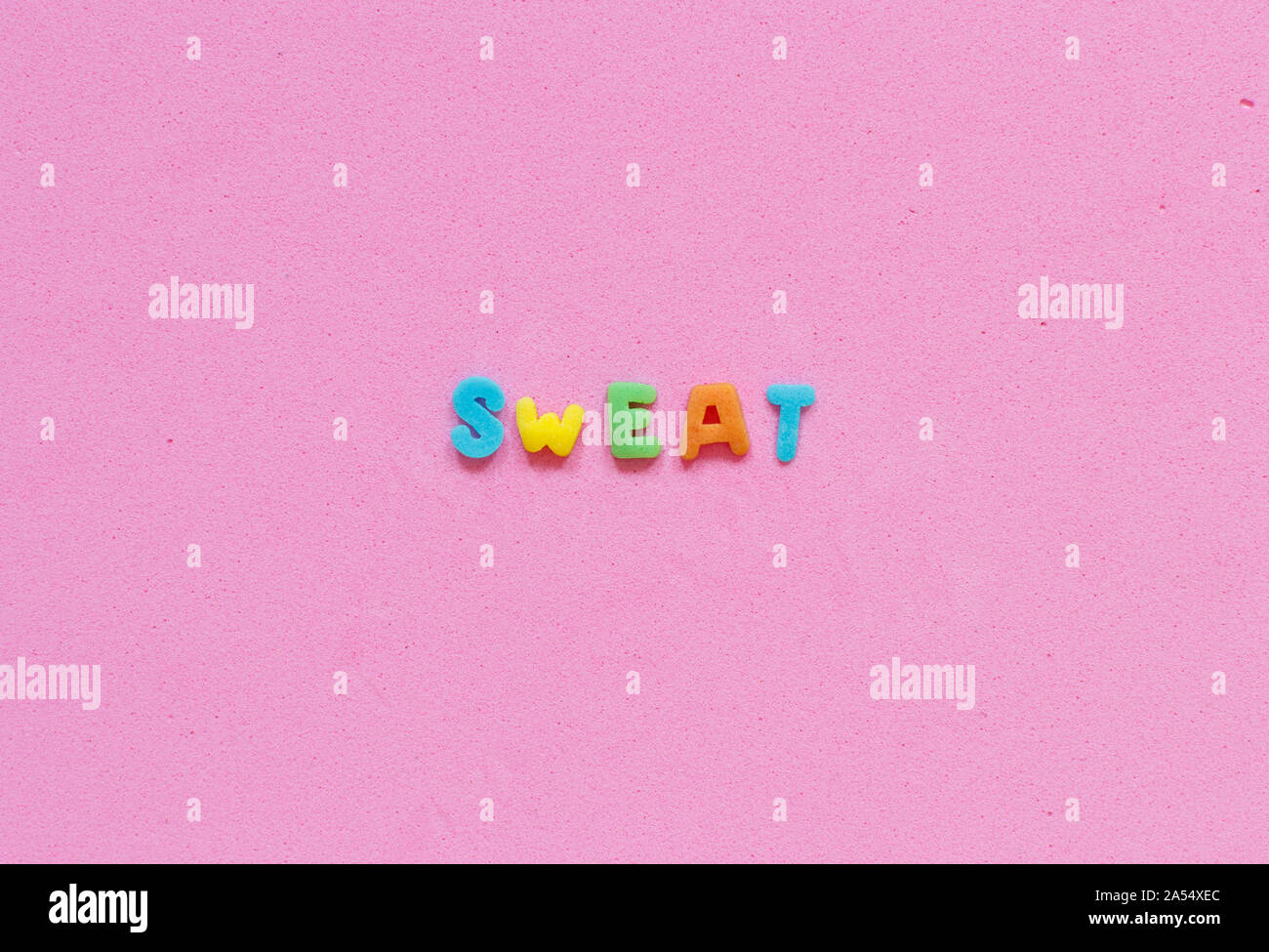 Colorful word Sweet on a bright pink background Stock Photo - Alamy
