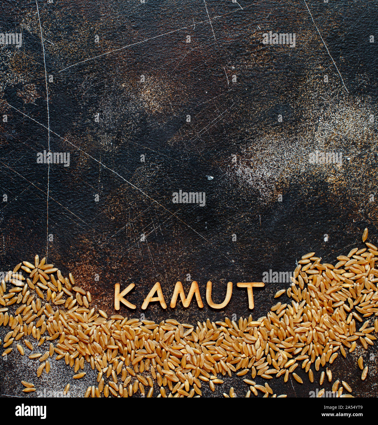 Raw Kamut grain with a word Kamut top view Stock Photo - Alamy
