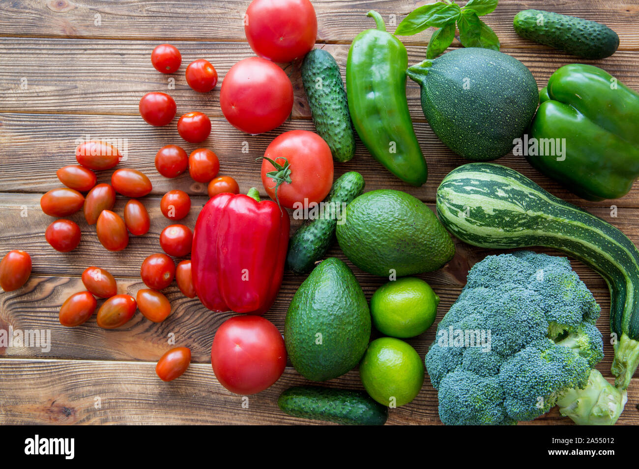 Assortment of bright vegetables, red and green, top view. Healthy ...