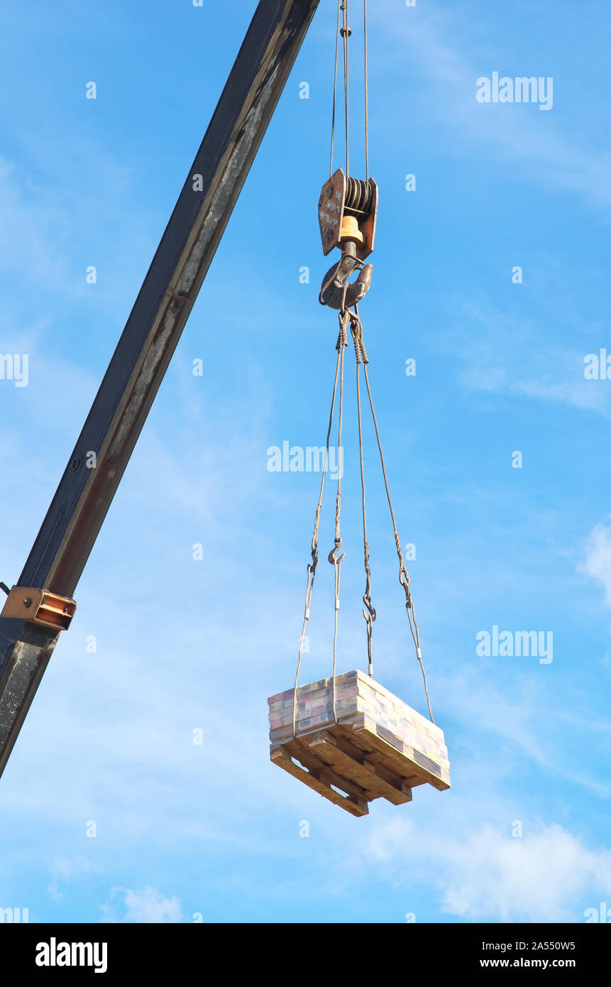 Crane and cargo. Element of building design Stock Photo - Alamy