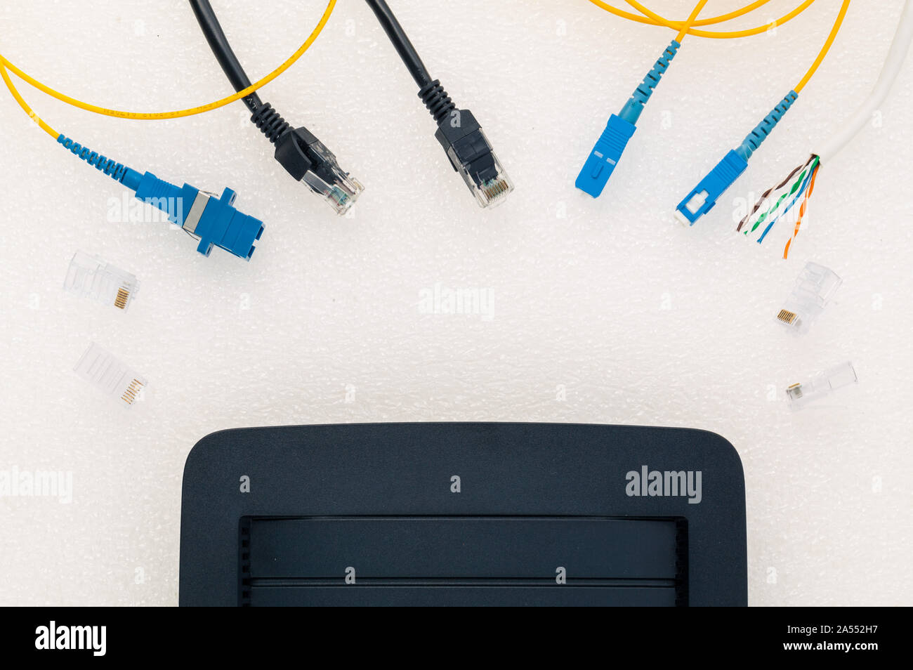 Above view of telecommunication connector with black router Stock Photo ...