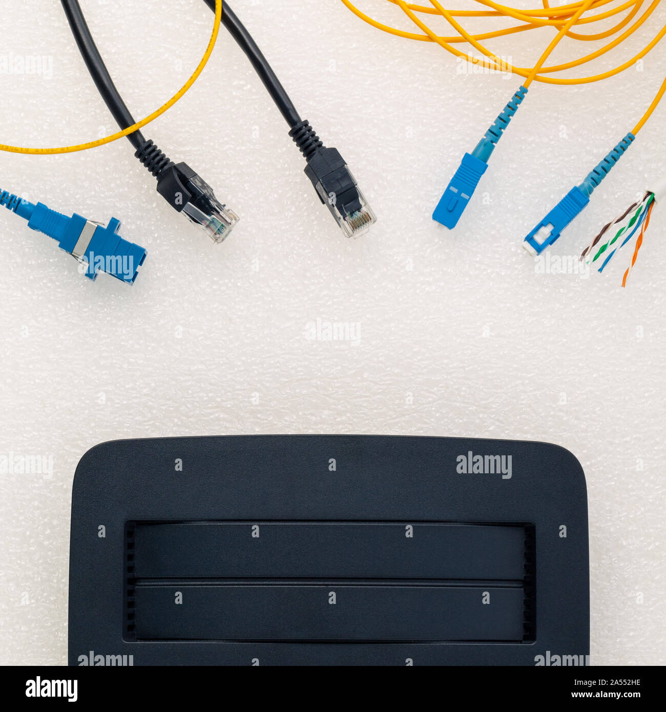 Above view of telecommunication connector with black router Stock Photo ...