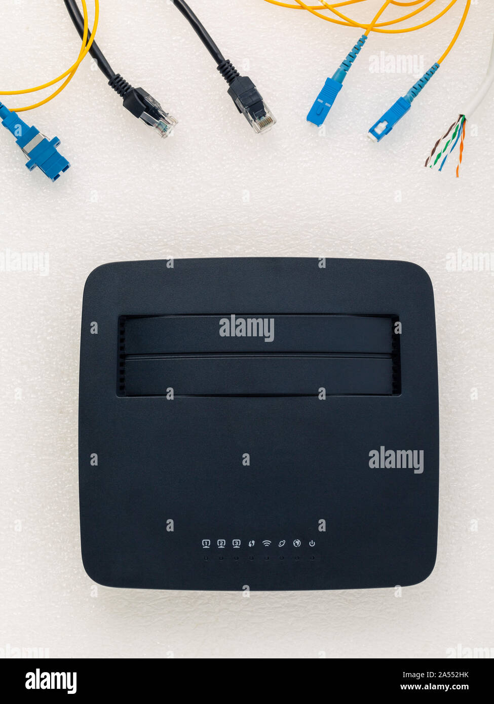 Above view of telecommunication connector with black router Stock Photo ...