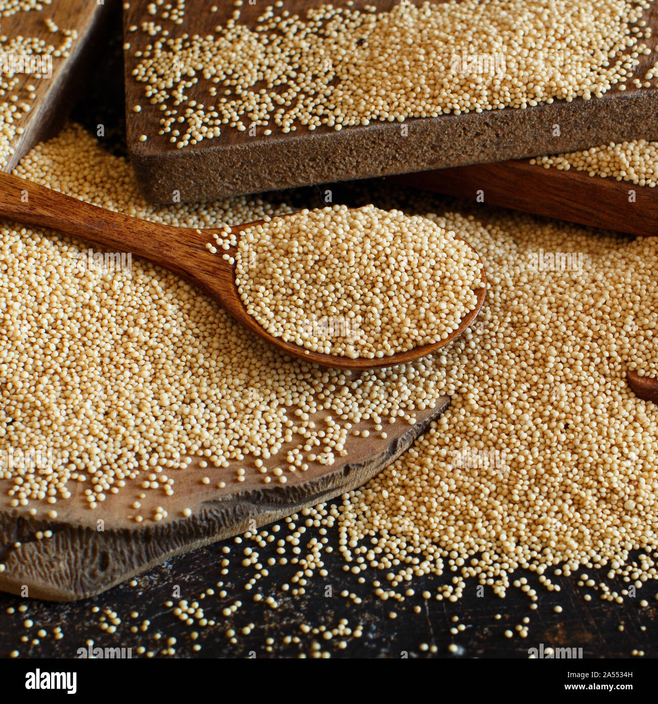 Raw Organic Amaranth grain on a dark table Stock Photo - Alamy