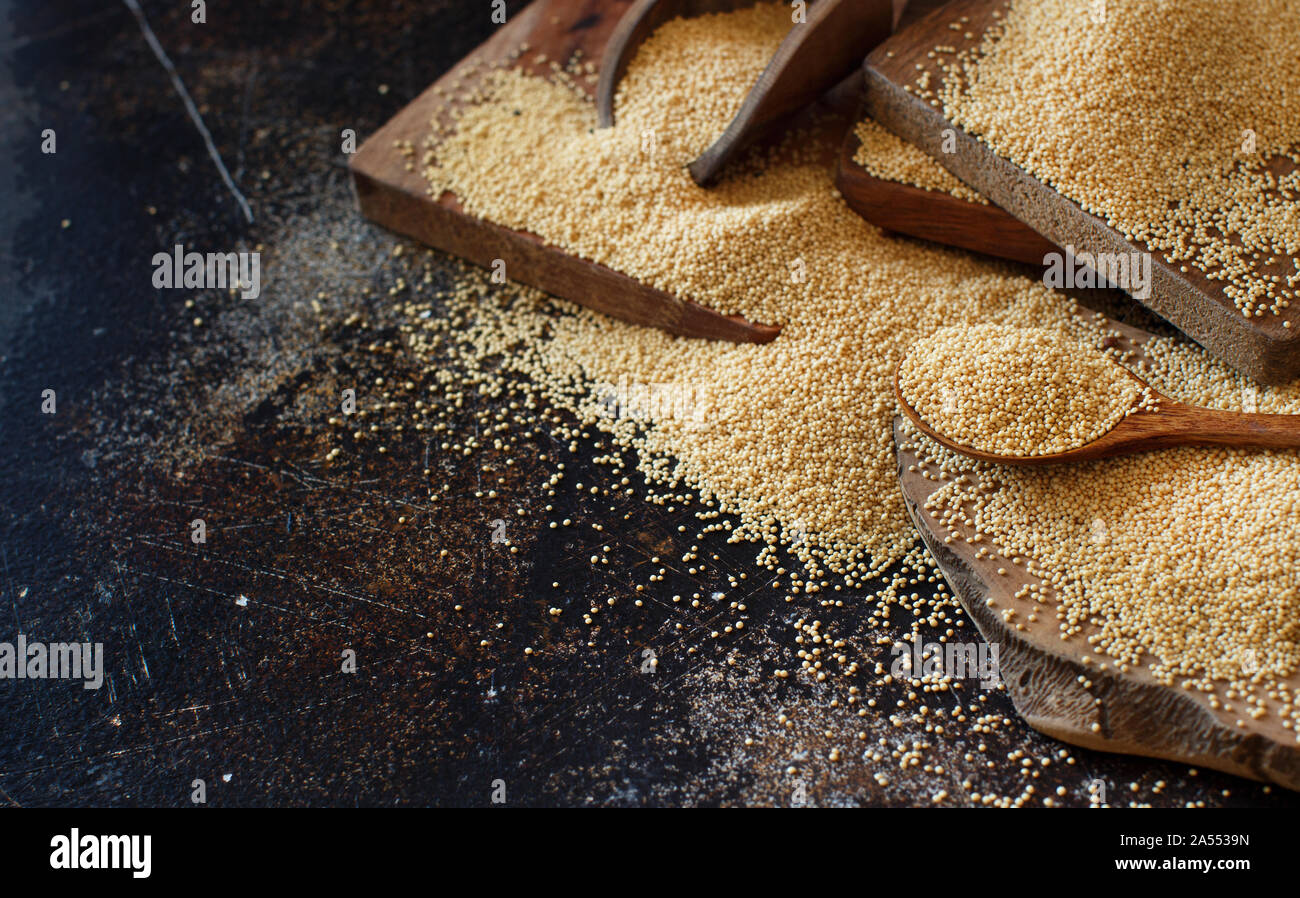 Raw Organic Amaranth grain on a dark table Stock Photo - Alamy