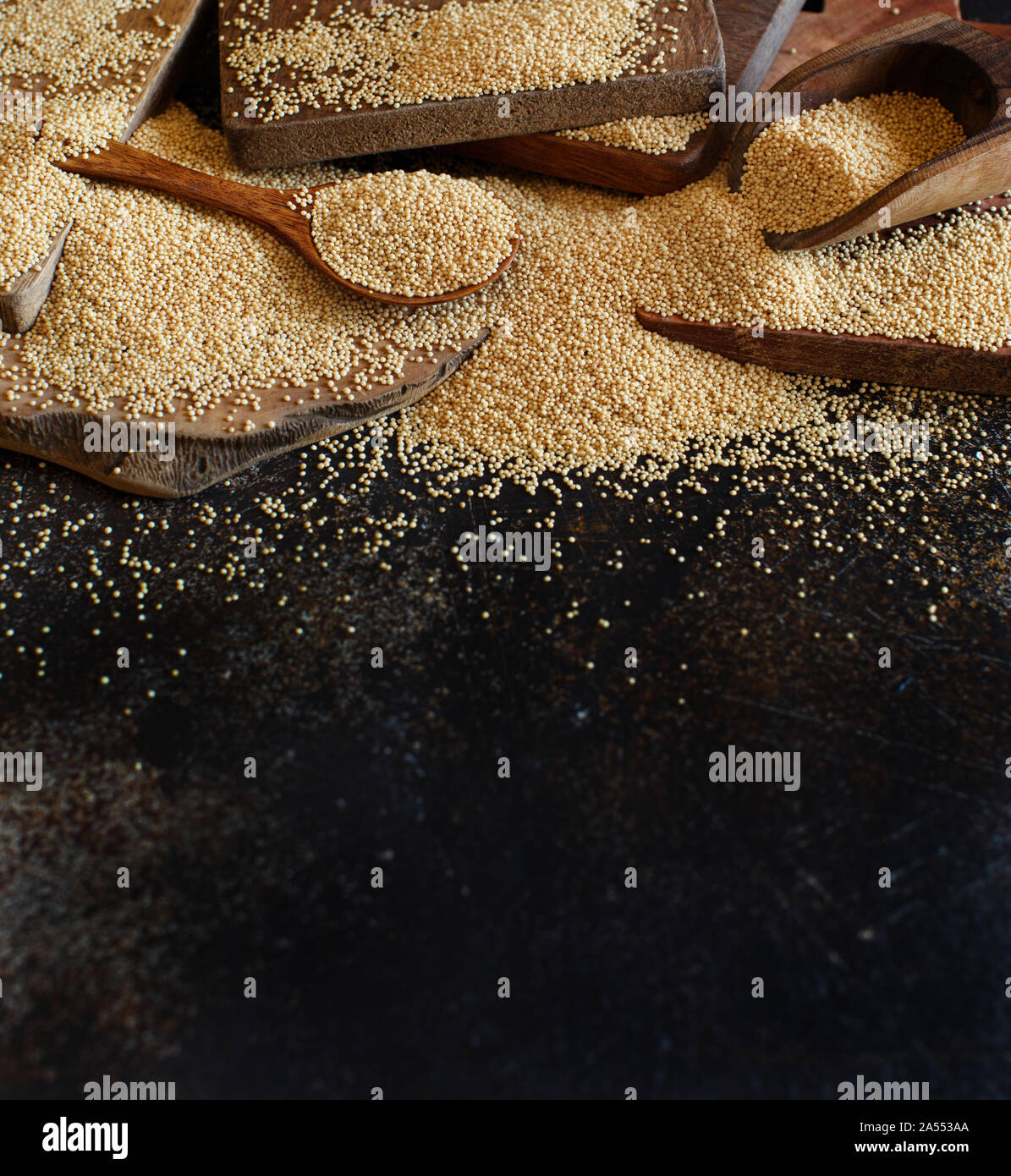 Raw Organic Amaranth grain on a dark table Stock Photo - Alamy
