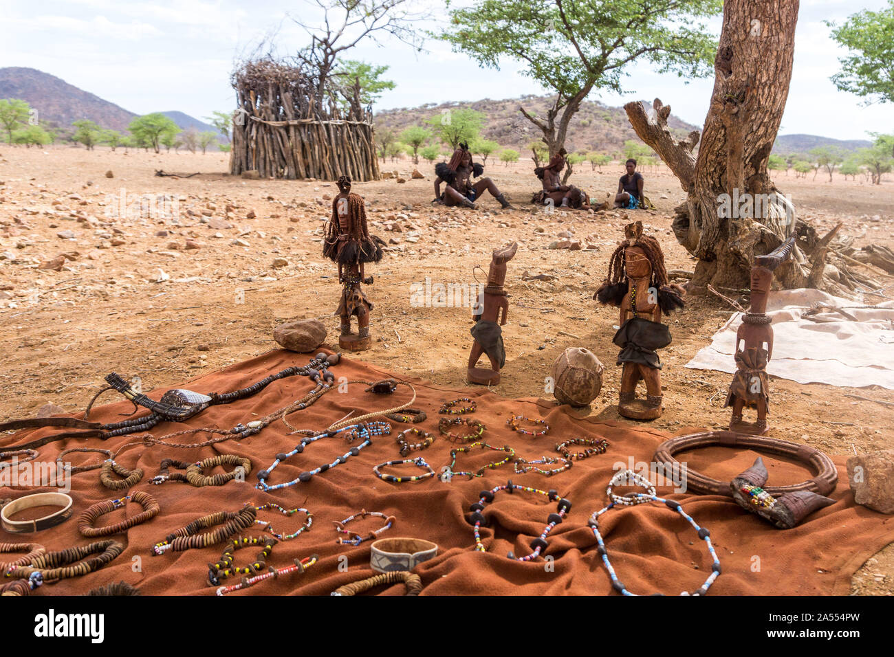 Traditional jewelry, wooden puppets, handcraft made by Himba people ...