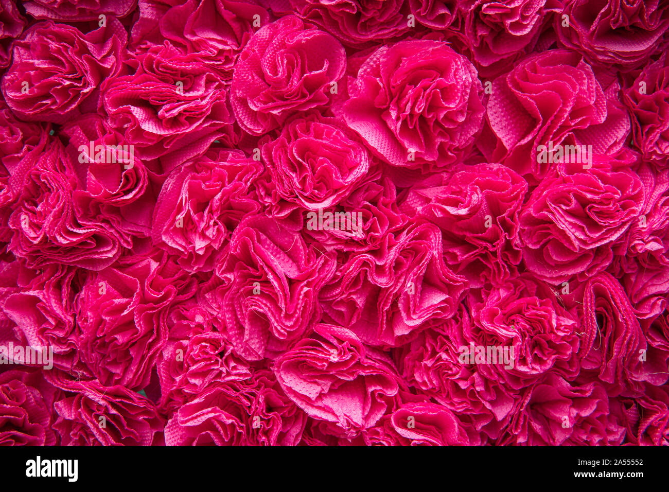 unnatural artificial flowers. red rose background , texture Stock Photo ...