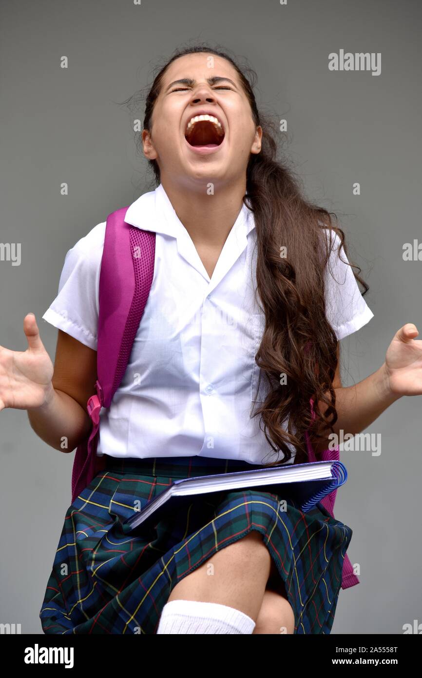 An Anxious Female Student With Notebook Stock Photo - Alamy