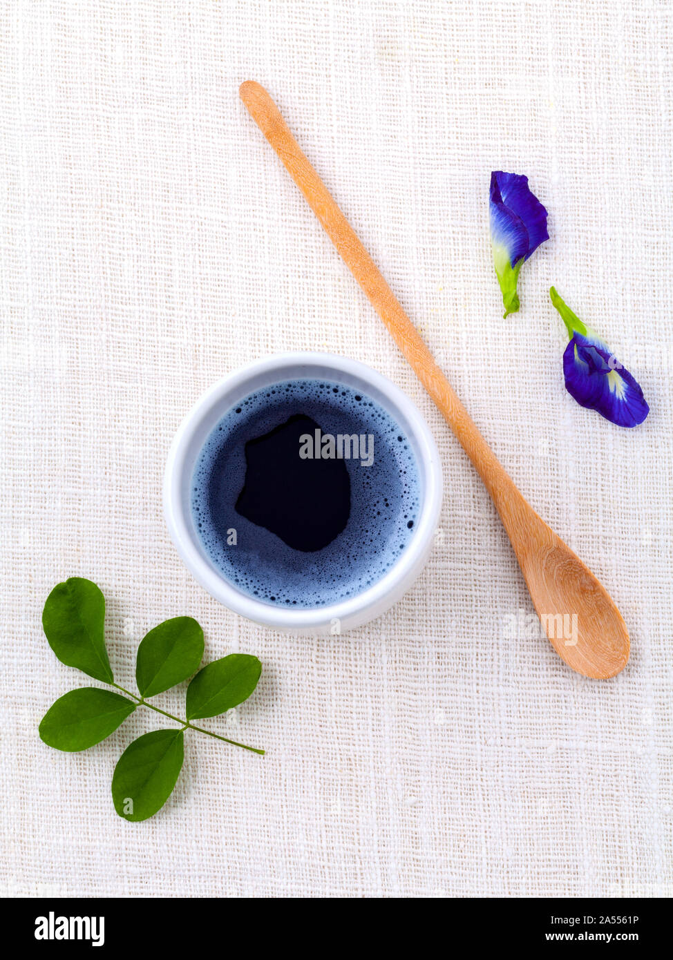pigeon wing pea healthy drinking water on white table Stock Photo - Alamy