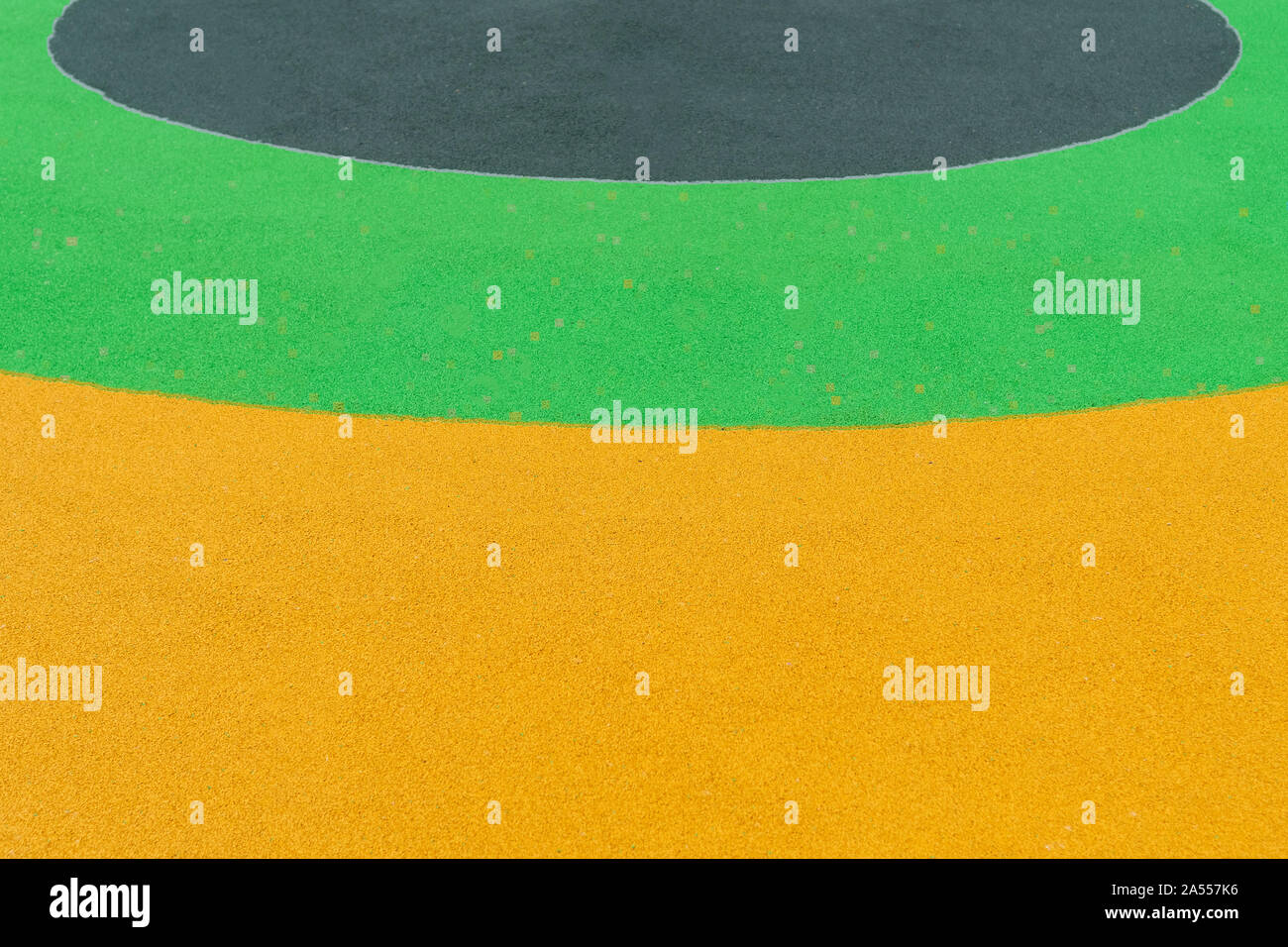 Bright multi-colored background from a coating of rubber crumb ...