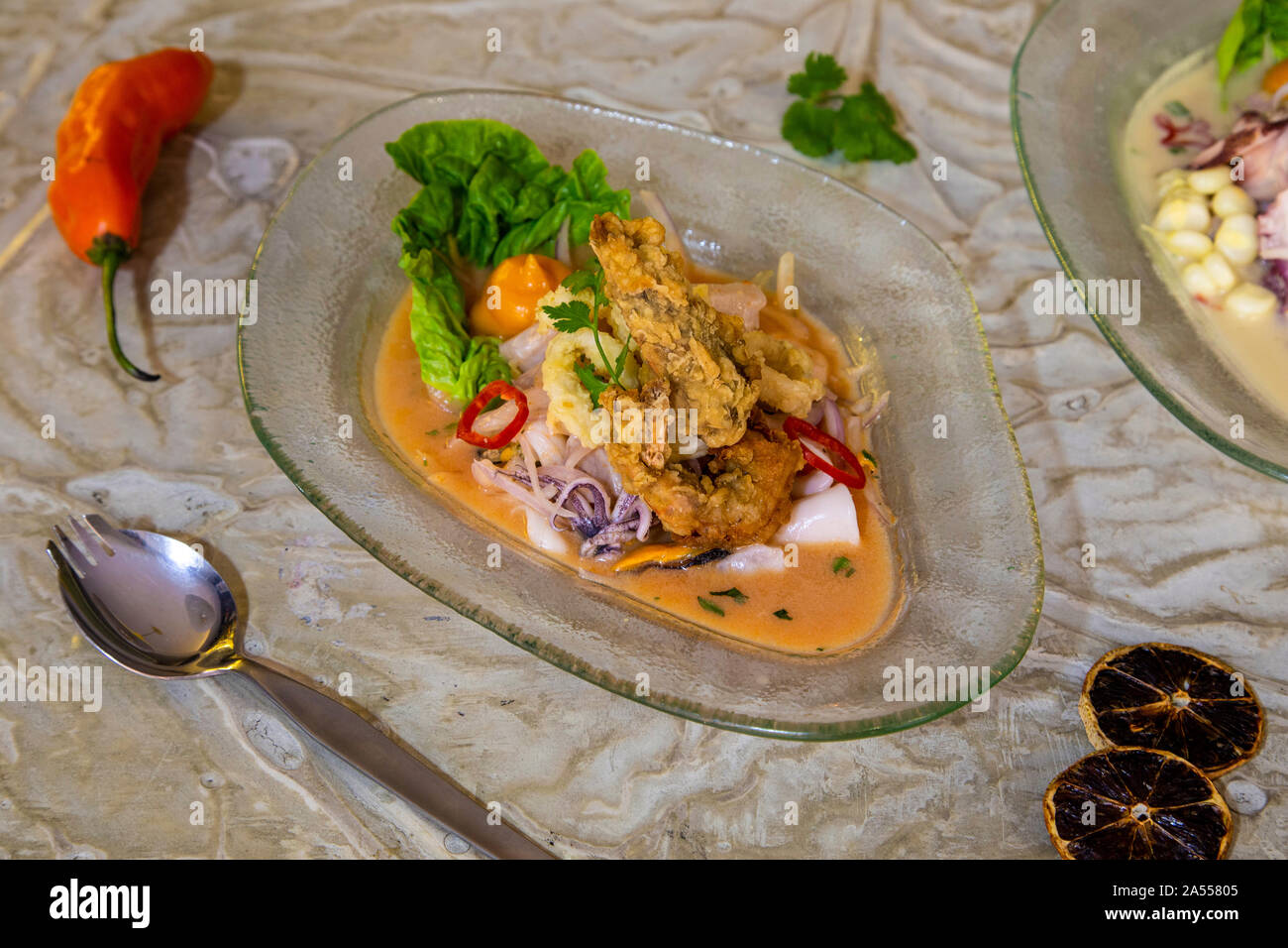 Typical Peruvian ceviche with sea bass and seafood, rocoto tiger milk ...