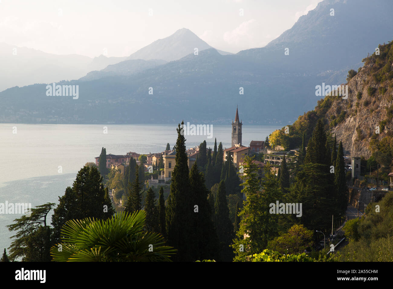Lake Como, mountains in fog, beautiful evening landscape. Italy ...