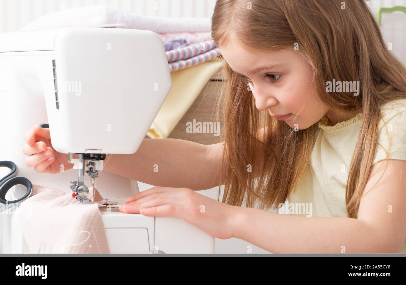 Kid sewing machine hi-res stock photography and images - Alamy
