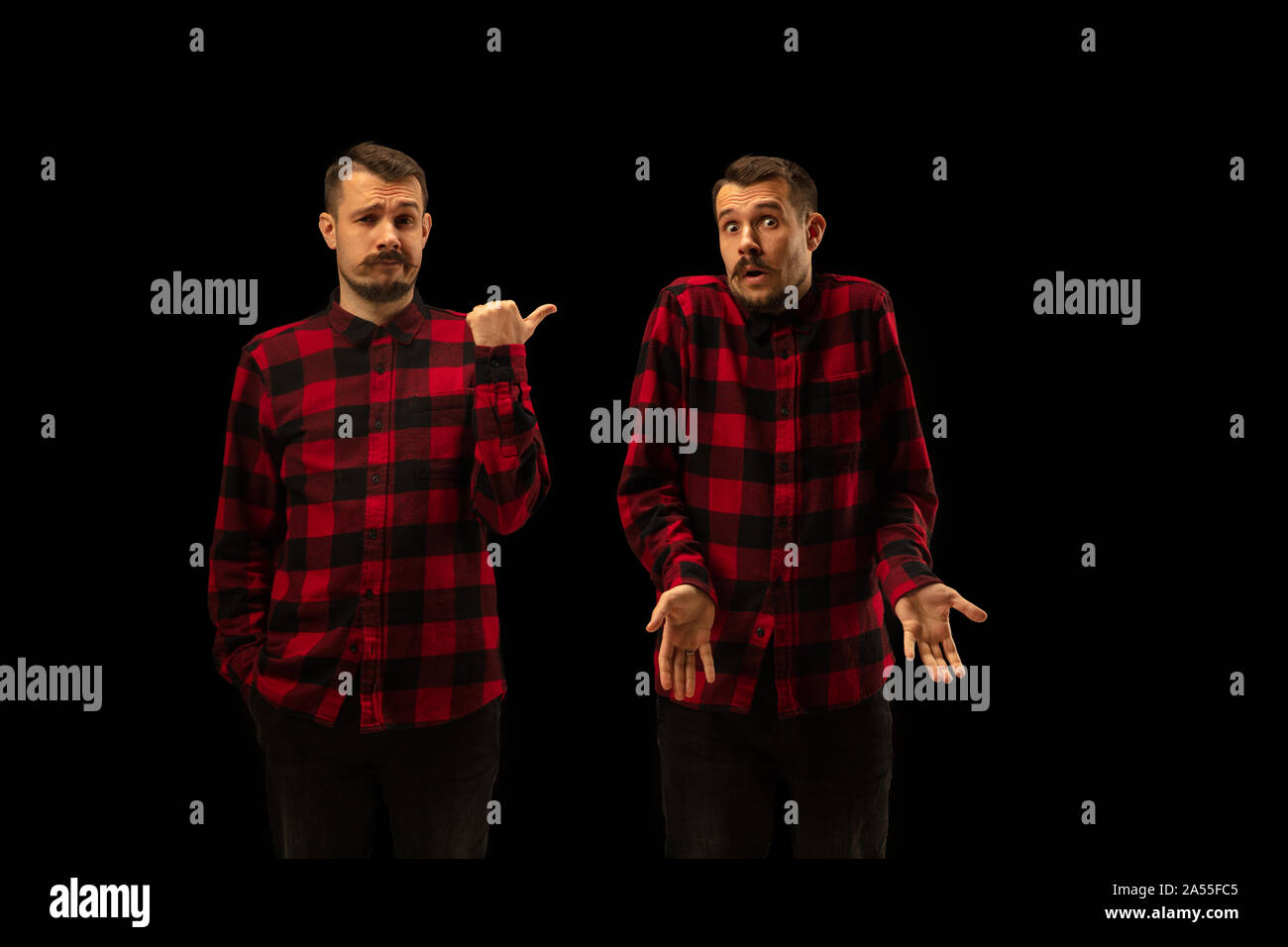 Young handsome man arguing with himself on black studio background ...