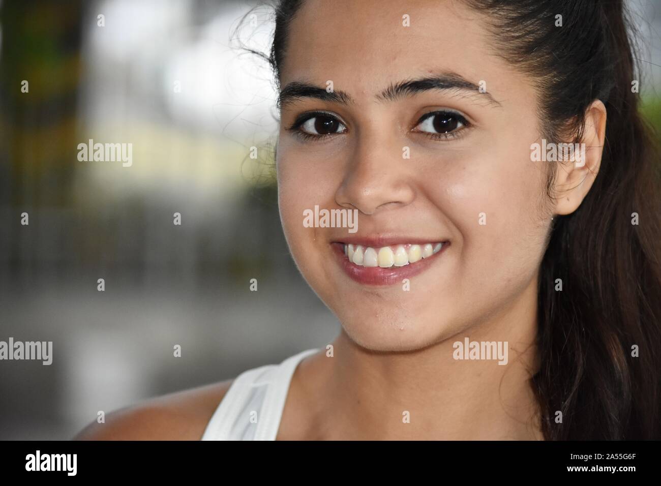 Smiling Face Of Cute Colombian Female Stock Photo - Alamy