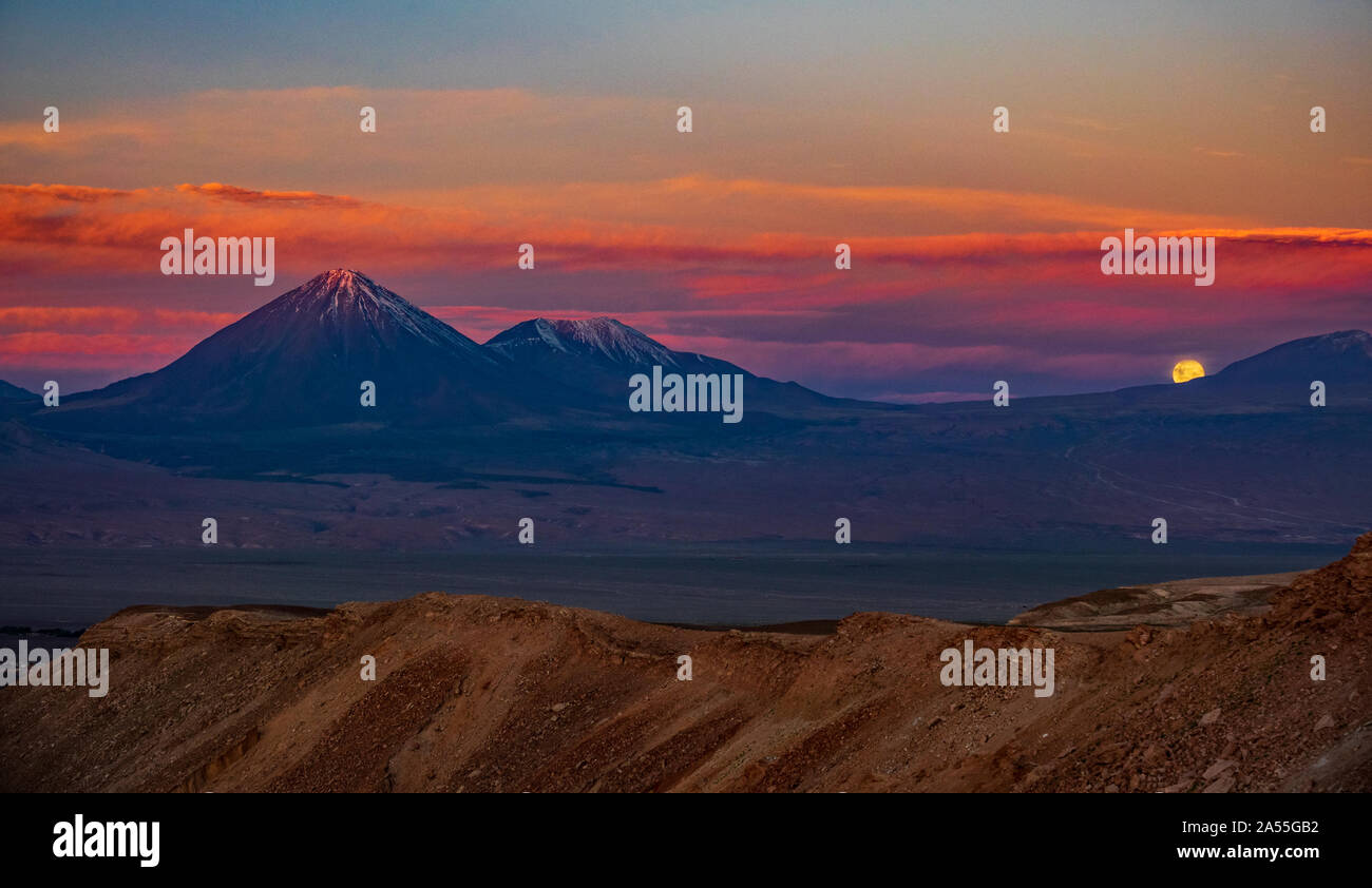 Moon rising over the mountains in Atacama desert Stock Photo - Alamy