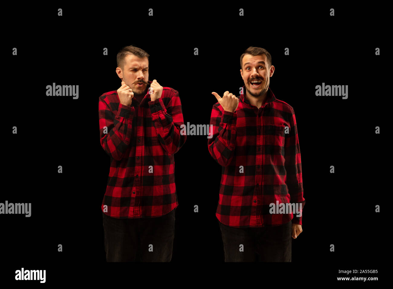 Young handsome man arguing with himself on black studio background ...
