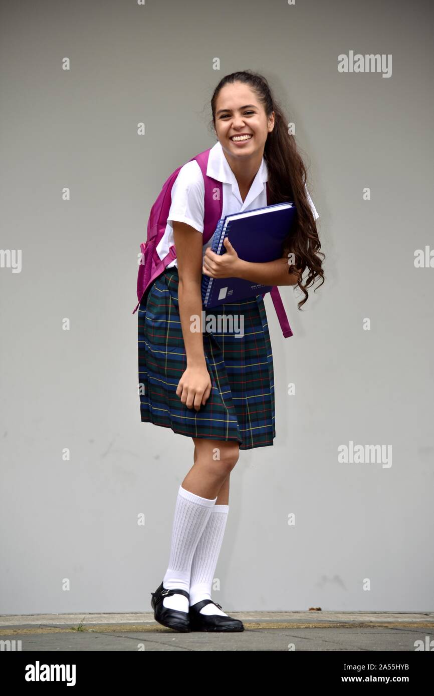 Standing Catholic Colombian Female Student Stock Photo - Alamy