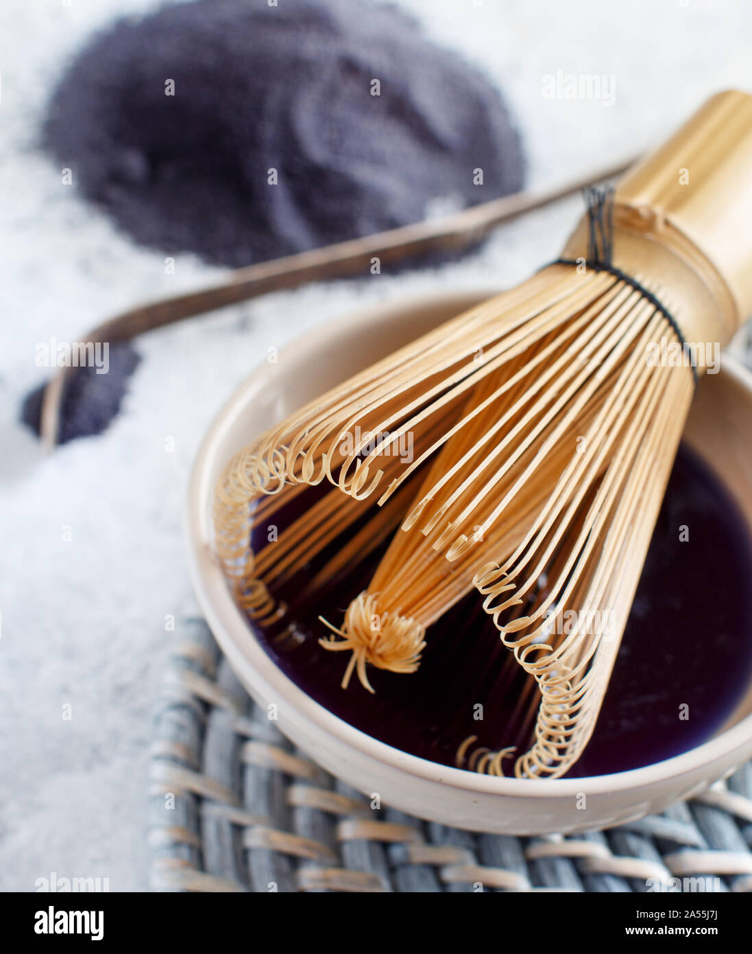 Butterfly pea blue matcha powder and mixed with water Stock Photo - Alamy