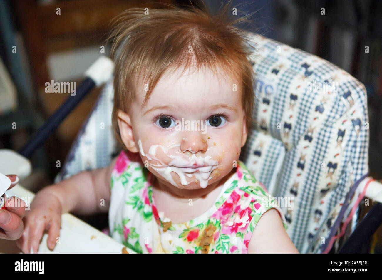 Baby girl covered in food hi-res stock photography and images - Alamy