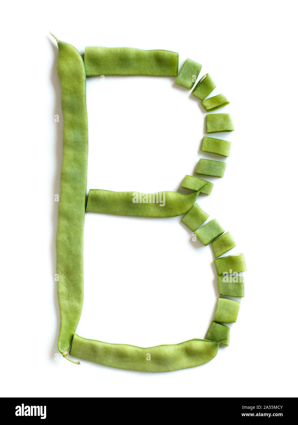 letter B made from Piattoni green beans top view isolated Stock Photo ...