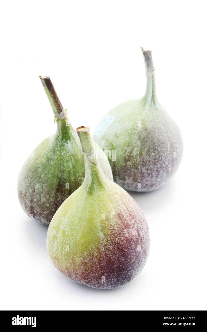 Three Figs Isolated On White Stock Photo - Alamy