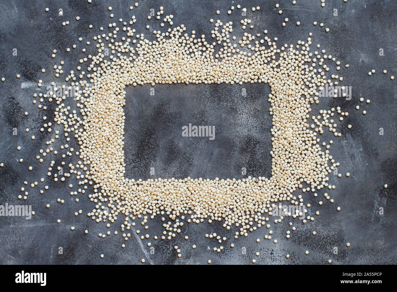 Raw White Sorghum grain with copy space on a grey table top view Stock ...