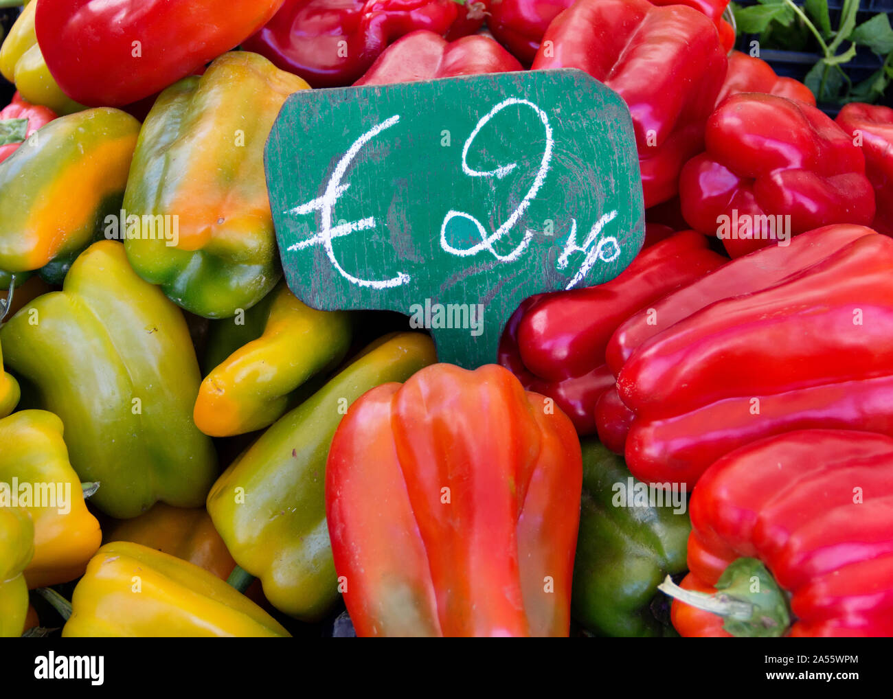 Bell Peppers on a farmer's market for sale with price Stock Photo - Alamy